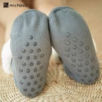 China Breathable Winter Anti Slip Floor Socks Cozy Thick Fuzzy Socks With Grips for sale