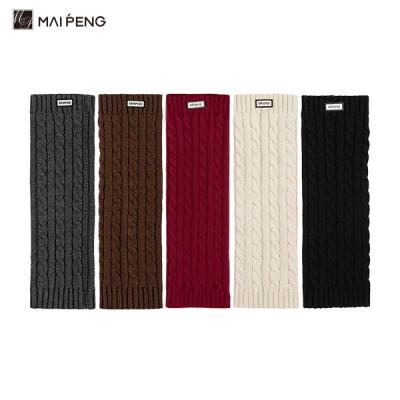 China Winter Trendy Women Leg Warmers Woven Labels Cable Knit Leg Warmers Socks for sale