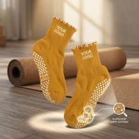 China Custom Ruffled Cuff Non-Slip Pilates Socks Women Gym Yoga Grip Socks for sale