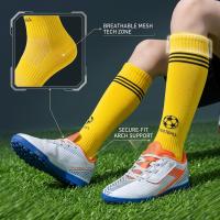 China Stirrup Shin Pad Sleeve Reflective Youth Football Socks Anti-Slip Grip Knee High Kids Soccer Training Socks for sale