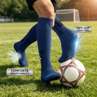 China Anti-Blister Arch Support Graduated Compression Football Socks Cushioned Athletic Knee High Soccer Grip Socks for sale