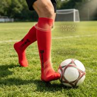 China Anti-Blister Arch Support Graduated Compression Football Socks Cushioned Athletic Knee High Soccer Grip Socks for sale