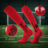 China Anti-Blister Arch Support Graduated Compression Football Socks Cushioned Athletic Knee High Soccer Grip Socks for sale