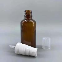 China 1 oz fine mist glass spray bottle 2 oz amber glass boston round bottles black treatment pump for sale