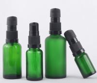 China Amber 4oz 2oz Green Glass Mist Spray Bottles 2 Oz Boston Round Spray Bottle With Fine Mist Sprayer for sale
