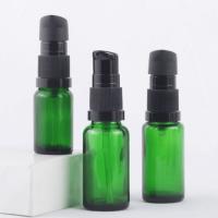 China Amber 4oz 2oz Green Glass Mist Spray Bottles 2 Oz Boston Round Spray Bottle With Fine Mist Sprayer for sale