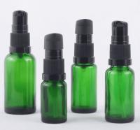 China Amber 4oz 2oz Green Glass Mist Spray Bottles 2 Oz Boston Round Spray Bottle With Fine Mist Sprayer for sale