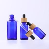 China 10 Ml Glass Cobalt Blue Essential Oil Bottles Eye Oil Pipette Dropper Bamboo Lids for sale