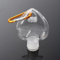 China 1.69oz 50ml Alcohol Hand Sanitizer Dispenser Bottles Empty Refill Mini Heart Shaped Keychain for sale