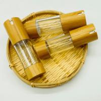 China Gold Bamboo Airless Pump Bottle 30ml 1.01oz Airless Dispenser Bamboo Containers For Cosmetics for sale