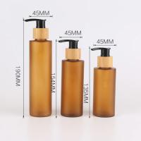 China 120ml 150ml 200ml Amber Plastic Shampoo Bottles With Pump Bamboo Skincare Packaging for sale