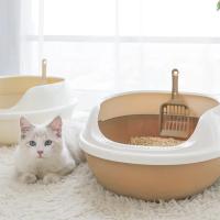 China Egg-Shaped Cat Litter Box with Anti-Splash Design and 150kg Capacity - Large Space Plastic Pet Toilet for Indoor Use for sale