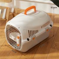 China Portable Pet Carrier Box 5-10kg Capacity with Four-Side Ventilation and Double Spring Lock for Dogs and Cats for sale