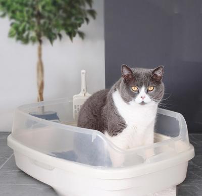 China Oversized Open Cat Litter Box 45x35cm with Anti-Splash Design and Included Litter Shovel - PP Plastic Pet Waste Management Solution for sale