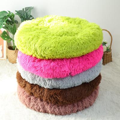 China Washable Donut Dog Cat Pet Bed Mat Soft Luxury Plush 60cm Round Designer Pet Bed for sale