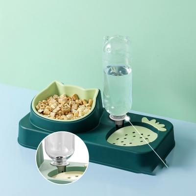 China 15 Degree Tilt Cat Bowl Feeder 2 in 1 ABS Plastic Pet Feeding Bowl with 500ml Automatic Water Dispenser for sale