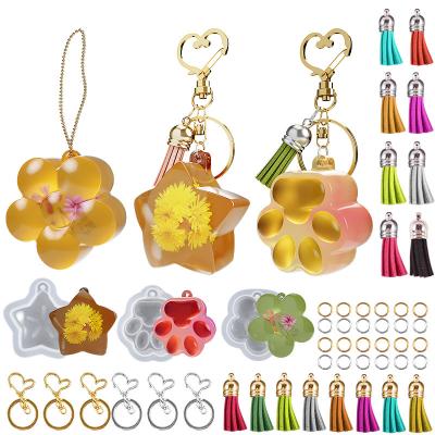China DIY dropper pendant keychain single hole semi three-dimensional cat paw pentagram flower silicone mold for sale