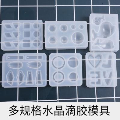 China DIY Crystal Dropping Gel Mold Irregular Earnail Pendant Dolphin Love Jewelry Ring Silicone Mold for sale