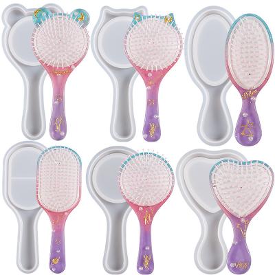 China Drip glue air cushion comb silicone mold DIY oval love cat ear teddy bear airbag massage comb grinder for sale