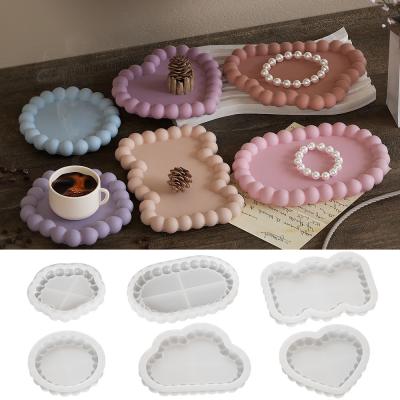 China DIY offers a variety of bubble coasters with geometric drop glue grinding, anti overflow storage, and silicone molds that sell well across borders for sale