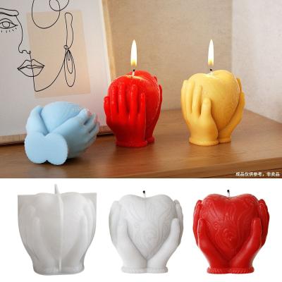 China DIY Drip Glue 3D Stereoscopic Hand Holding Love Candle Platform Mold Aromatherapy Gypsum Pendant Silicone Mold for sale