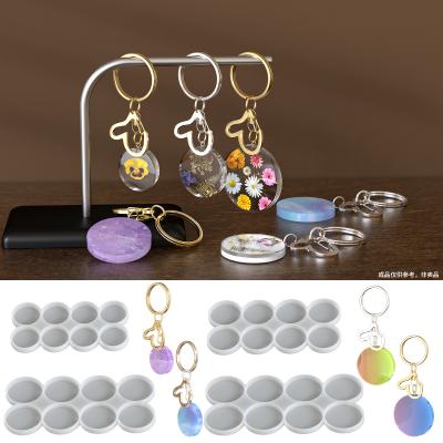 China DIY resin 8-connected circular pendant dropper mold, aromatherapy keychain, backpack hanging decoration silicone mold for sale