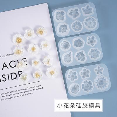China DIY crystal drop glue mold small flower decoration whole board multi specification daisy silicone mold wholesale for sale