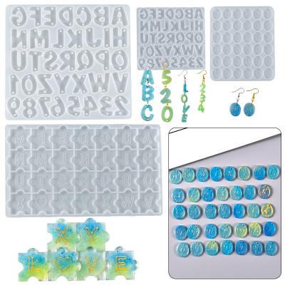 China Crystal dropper DIY resin grinding tool puzzle with holes, number letter pendant bracelet, silicone mold for sale