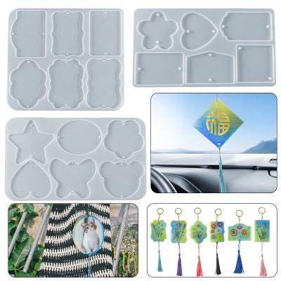 China DIY resin dropper grinding tool double hole tassel hanging pendant keychain silicone mold spot wholesale for sale