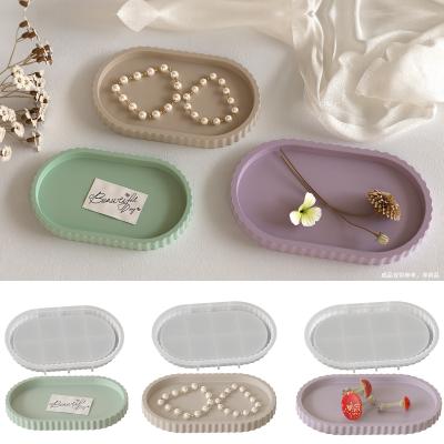 China Elliptical striped gear wave aromatherapy gypsum tray silicone mold DIY mirror resin mold for sale