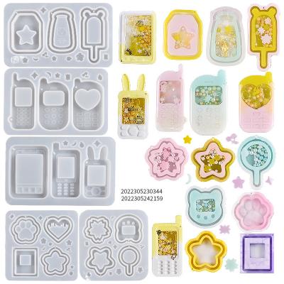 China DIY Drip Glue Sand Grinding Tool Rabbit Phone Love Flower Cat Claw Sand Keychain Silicone Mold for sale