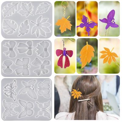 China DIY Crystal Dropping Gel Hairpin Hair Clip Mold Mirror Flower Bow Earrings Earrings Leaf Pendant Silicone Mold for sale