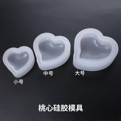 China DIY Crystal Dropping Gel Mold Cake Mold Jewelry Love High Brightness Mirror Size Peach Heart Silicone Mold for sale