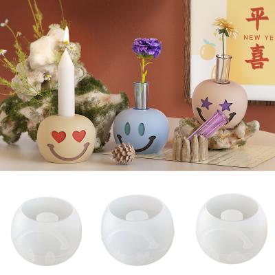 China DIY resin plaster candle holder ornament, round heart-shaped star smiling face flower planter, silicone mold for sale