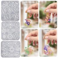 China DIY crystal drop glue flower shaped earring pendant mold, leaf bouquet flower, rose petal shaped pendant hanging mold for sale