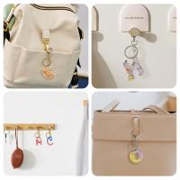 China DIY Drip Glue Resin Mirror 26 English Alphabet Number Irregular Perforated Key Pendant Silicone Mold for sale
