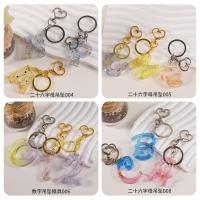 China DIY Drip Glue Resin Mirror 26 English Alphabet Number Irregular Perforated Key Pendant Silicone Mold for sale