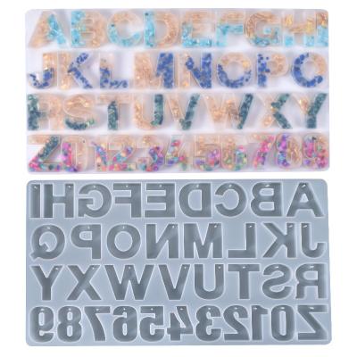 China DIY crystal dropper mold with hole free and perforated numbers and letters full page pendant jewelry silicone mold for sale