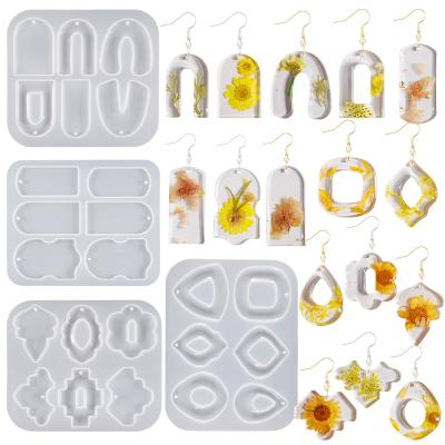 China DIY Crystal Dropping Gel Irregular Shield U-shaped Flower Leaf Earrings Pendant Silicone Mold for sale