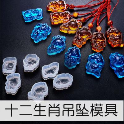 China DIY Zodiac Mold Pendant Pig, Cow, Rabbit Silicone Mold Jewelry Mold Crystal Dropping Grinding Tool for sale