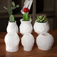 China DIY Crystal Drop Glue Relief Vine Flower Pattern Vase Aromatherapy Gypsum Storage Can Silicone Mold for sale