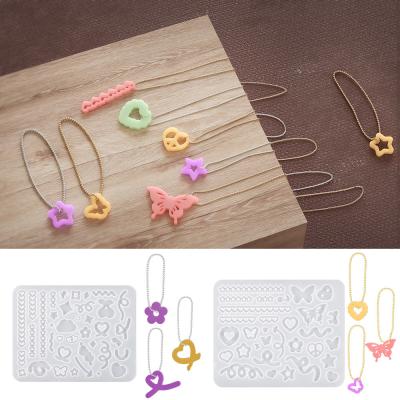 China Crystal Drip Glue Flowing Sand Small Accessories DIY Love Pentagram Resin Bracelet Pendant Silicone Mold for sale