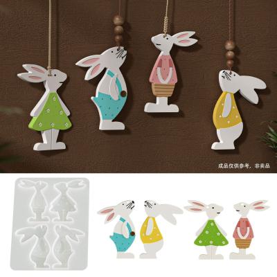 China Easter DIY Resin Gypsum Four Grid Little Rabbit Pendant Hanging Key Hanging Silicone Mold for sale