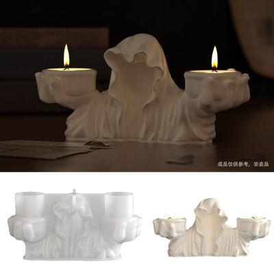 China Halloween Big Robe Wizard Candlestick Silicone Mold DIY Gypsum Ghost Hand Holding Candlestick Candlestick Pendant Mold for sale