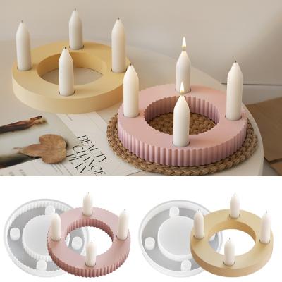 China Crystal dropper resin gypsum table DIY striped smooth four hole candle table base silicone mold for sale