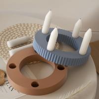 China Crystal dropper resin gypsum table DIY striped smooth four hole candle table base silicone mold for sale