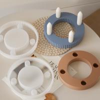 China Crystal dropper resin gypsum table DIY striped smooth four hole candle table base silicone mold for sale