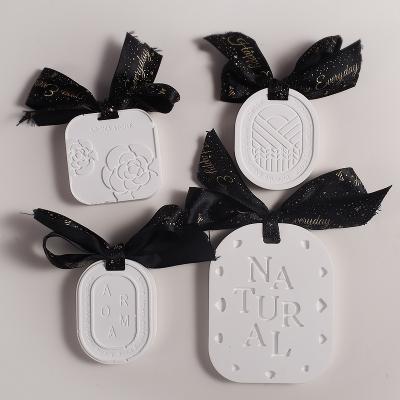 China DIY Camellia Gypsum Hanging Silicone Mold Wardrobe Car Aromatherapy Wax Sheet AROMA Fragrance Stone Grinding Machine for sale