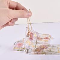 China DIY Drip Resin Photo Grinding Stretch Easy Pull Buckle Hanging Dry Flower Keychain Pendant Silicone Mold for sale