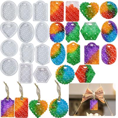 China Crystal Dropper Mold DIY Clover Heart-shaped Hexagonal Hanging Wave Elliptical Silicone Mold for sale